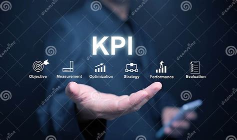Kpi Key Performance Indicator A Businessman In His Hand Uses Kpis To Measure Progress Of His