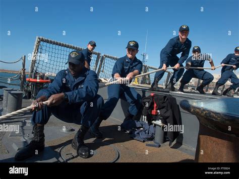 Us Navy Sailors Aboard The Uss Simpson Ffg 56 Handle A Mooring Line