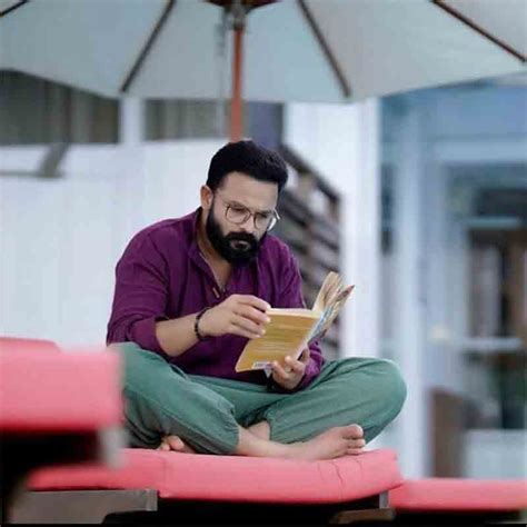 Jayasurya Busy With Books Photos Plus