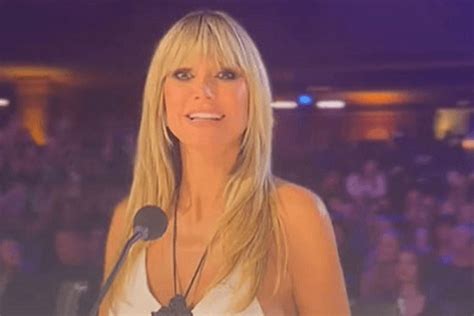 In A Plunging Dress Heidi Klum Shimmy At The Camera On Agts Set