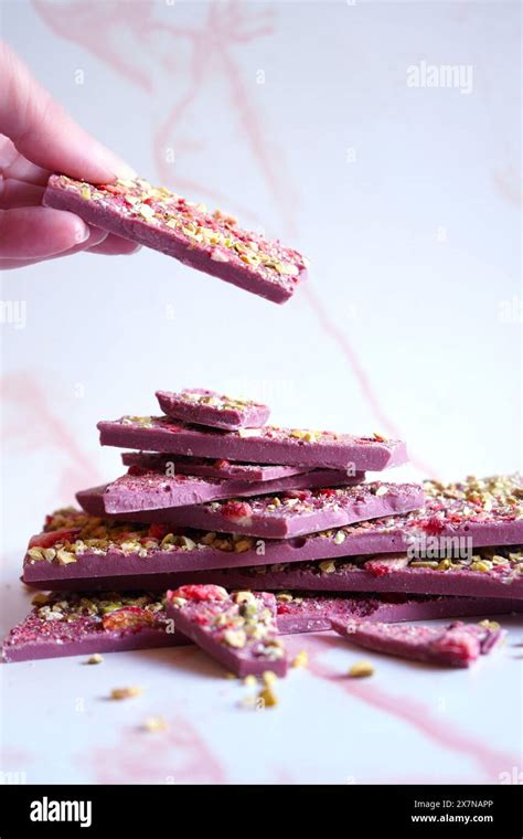 Ruby Chocolate Made From Selected Botanical Cocoa Bean Varieties Dried Strawberry And Pistachio