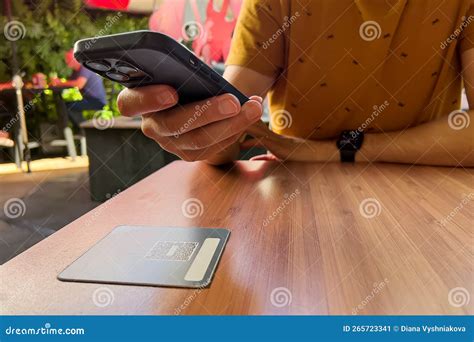 Man Scanning Qr Code From The Table In The Cafe Or Restaurant With His Phone Stock Image Image