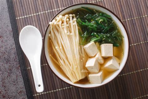 Enoki Miso Soup With Tofu Cheese And Seaweed Close Up In A Bowl