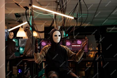 Premium Photo Masked Thief Threatening Victim Mobile Ransomware Data Leak Criminal Speaking