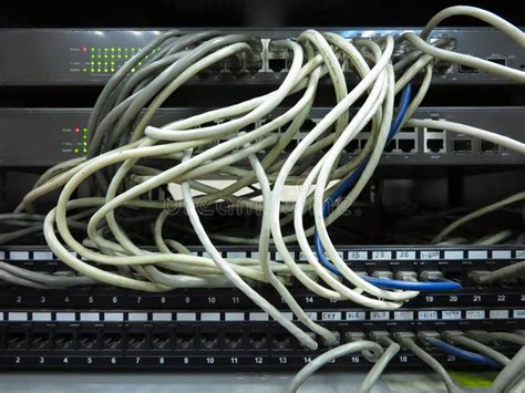 Close Up Network Cables Connected To Switch In Server Rack Stock Image