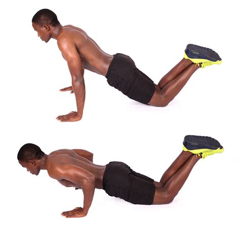 Shirtless Muscular Man Demonstrates How To Perform Knee Push Ups High