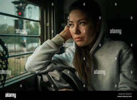 Young Attractive Female Passenger Travel By Passenger Train In India