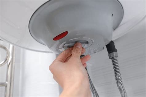 Woman Adjusting Maximum Energy Efficiency Indicator Indoors Closeup Boiler Installation Stock