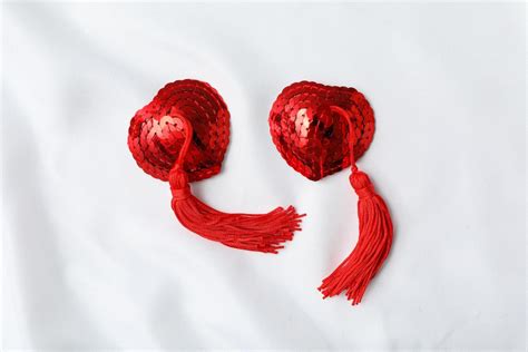 Premium Photo Sex Toy Nipple Cover In The Shape Of Hearts With Sequins