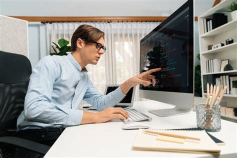It Developer Pointing On Coding Software On Pc Comparing Laptop