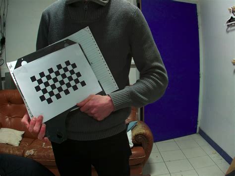 Strange Distortion Coefficients After Calibration Calib3d Opencv
