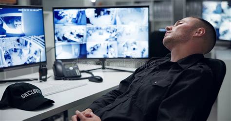 Security Guard Computer Screen And Tired By Cctv Monitor For Protection Data Center Or