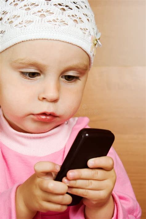 Baby With Mobile Phone Stock Photo Image Of Hand Examine