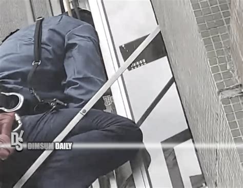 Elderly Man Rescued After Perching Dangerously On Clothes Rack In