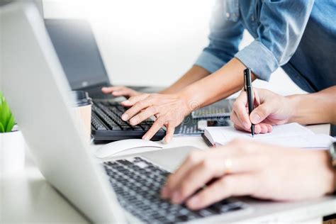 Asian Team Outsource Developer Looking Screen Programming Code Working