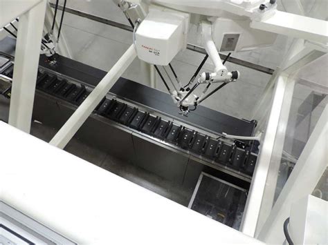 Packaging Equipment Load And Unload Remtec Robotics And Automation