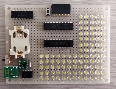 led clock uses micro qr codes to show the time hackaday