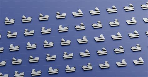 A Large Group Of White Lego Blocks Sitting On Top Of A Blue Surface Photo Aircraft Carrier