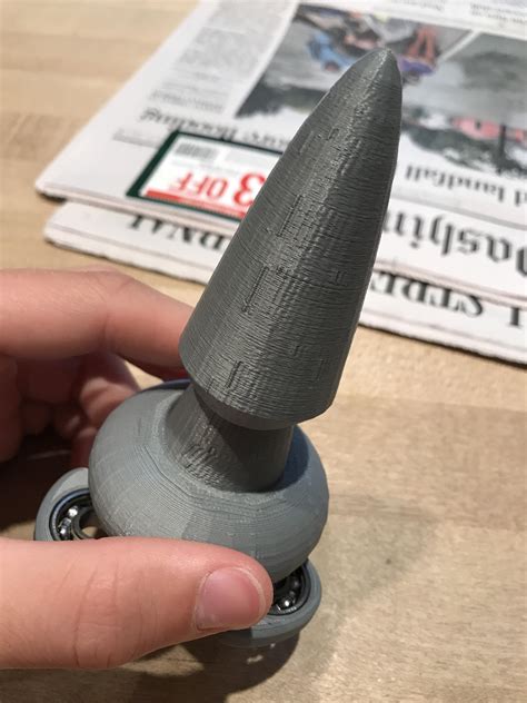 how can i get rid of these werid burrs on the side of my fidget spinner