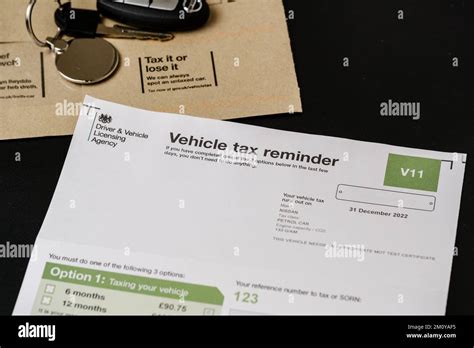 Authentic V11 Vehicle Tax Reminder Letter From Dvla Placed On Brown