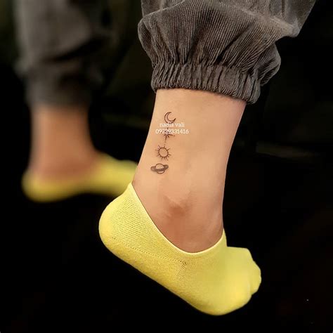 تاتو مینیمال طرح خورشید و ماه و سیاره تاتو شکم و بدن