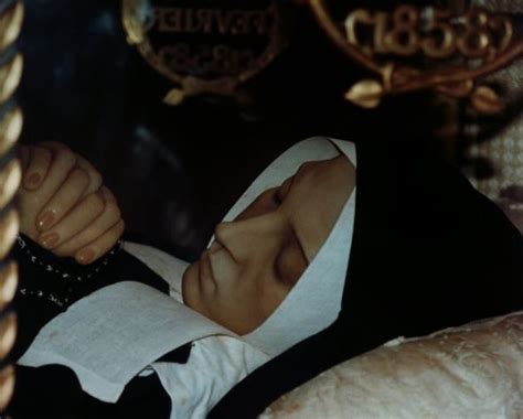 St Bernadettethis Is A Photo Of Her She Is Encased In A Glass