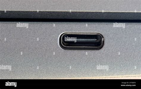 usb c data charging monitor output port input on the side of a modern laptop computer macro
