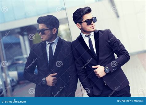 Handsome Stylish Man In Elegant Black Suit And Sunglasses Stock Image