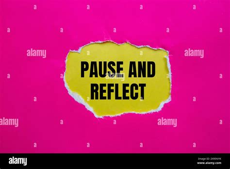 Pause And Reflect Words Written On Ripped Pink Paper With Yellow Background Conceptual Pause