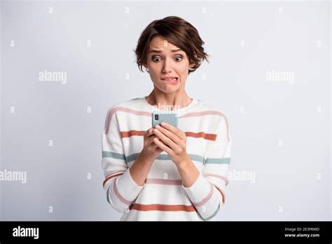 Photo Of Guilty Young Lady Wear Striped Sweater Holding Looking Modern