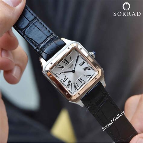 ساعت کارتیر زنانه ساده بند چرمی رنگ مشکی صفحه مشکی طلایی فروشگاه سراد