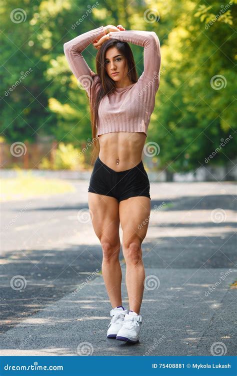 Beautiful Muscular Girl Posing Outdoor Athletic Woman With Big Quads