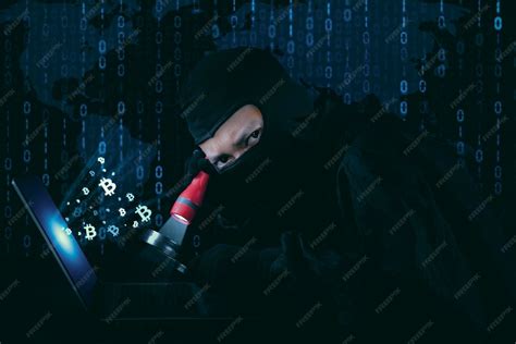 Premium Photo Hacker With Flashlight Trying To Hack In To A Customer