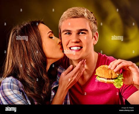 Man And Woman Eating Big Sandwich Stock Photo Alamy