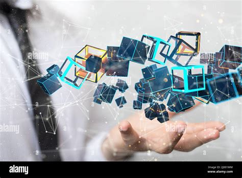 Businessman Holding A Floating Render Of Digital Connected Cubes Stock Photo Alamy