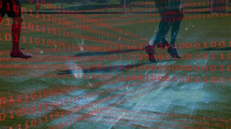 Binary Code Overlay On Football Players On Green Field