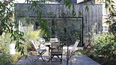 Studio BAM Builds Charred Wood Clad Infill House In London Garden