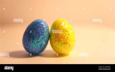 Colorful Easter Eggs Rotating In Rows In A Seamless Loop On A Light