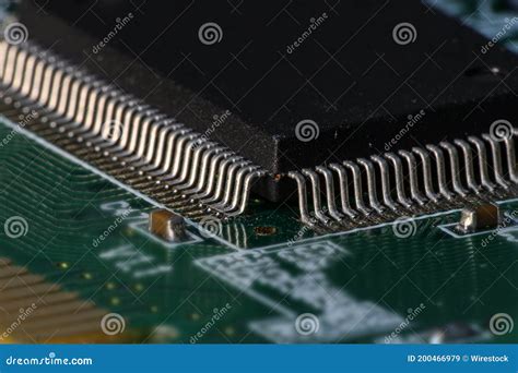 Integrated Semiconductor Microchip Microprocessor On Blue Circuit Board Royalty Free Stock