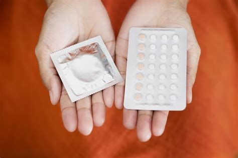 Premium Photo Birth Control Pills And Condoms