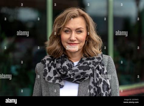 Portrait Of A Beautiful Blonde Woman 55 Years Old Smiling Stock Photo