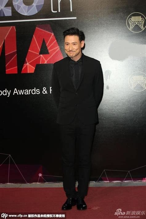 张学友黑西装酷帅现身 英姿飒爽势不可挡新浪图片