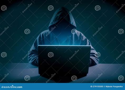 Hooded Hacker With A Laptop On The Background Of Binary Code Stock