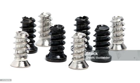 태핑 나사 및 많이 사진 쵤영된 클로즈업 흰색 바탕에 그림자와 0명에 대한 스톡 사진 및 기타 이미지 0명 2015년 검은색 Istock