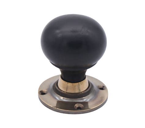 Spira Brass Ebony Bun Rimmortice Door Knob 60mm Aged Brass