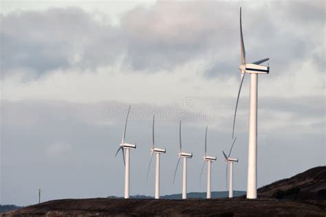 Turbines Aligned In A Row On The Cumbrian Coast Near Workington Stock