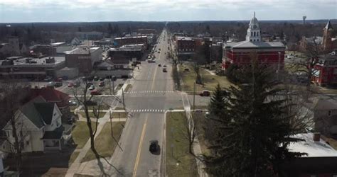Downtown Charlotte Michigan Skyline With Droneing Up Stock Footage