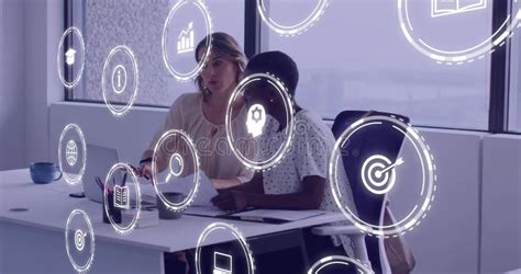 Animation Of Digital Business Icons Over Diverse Business People In