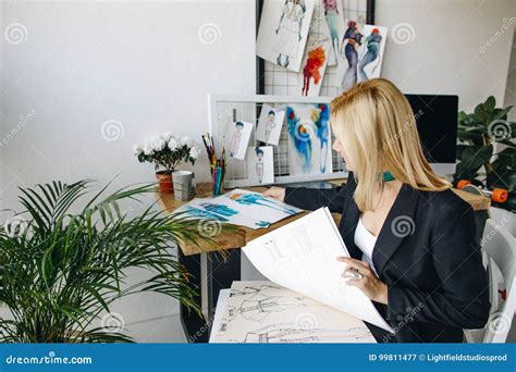 Fashion Designer Working With Sketches Stock Image Image Of Indoors