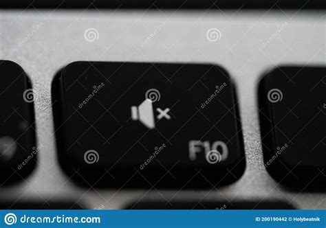 Close Up Of Keyboard Volume Mute Key On Space Grey Metal Stock Photo Image Of Button Fingers